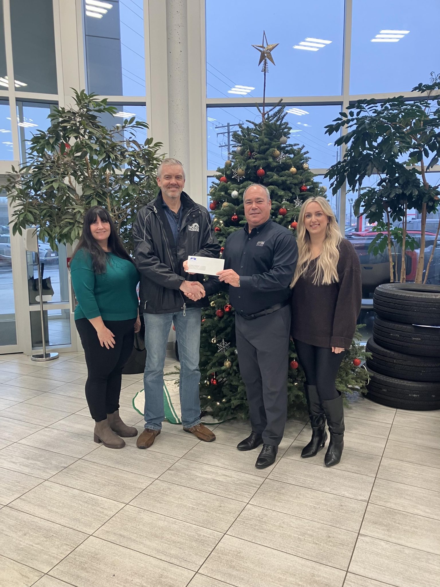 Driving Change: West Coast Auto Group Donates $4,500 and 920 LBs of ...